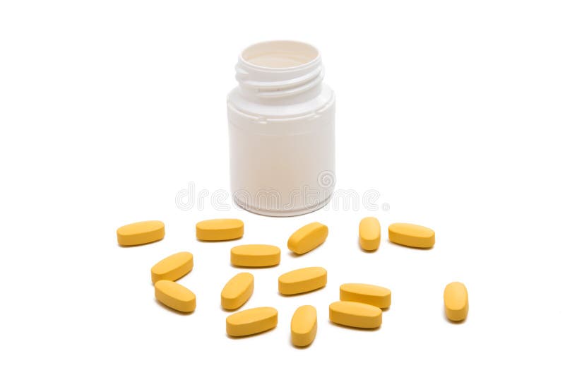 Yellow capsules isolated stock image. Image of pills - 148832815