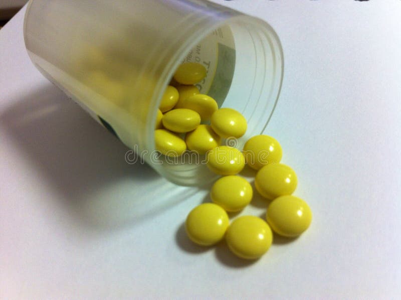 Yellow pills stock photo. Image of treatment, sedative - 43296708