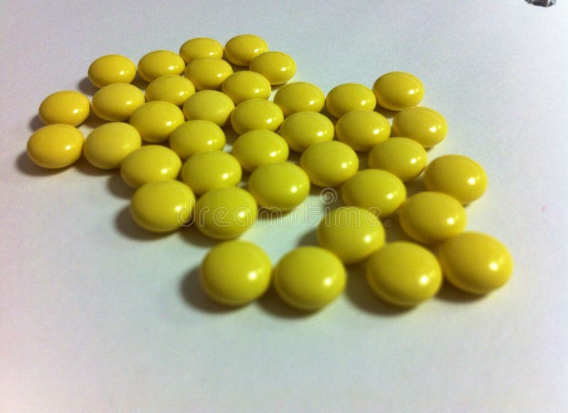 Yellow pills in stock image. Image of sedative, pills - 43297055