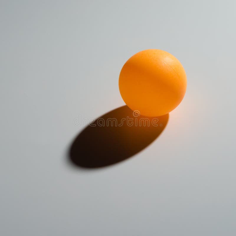 Yellow Pingpong Ball on Grey Stock Photo - Image of pingpong ...