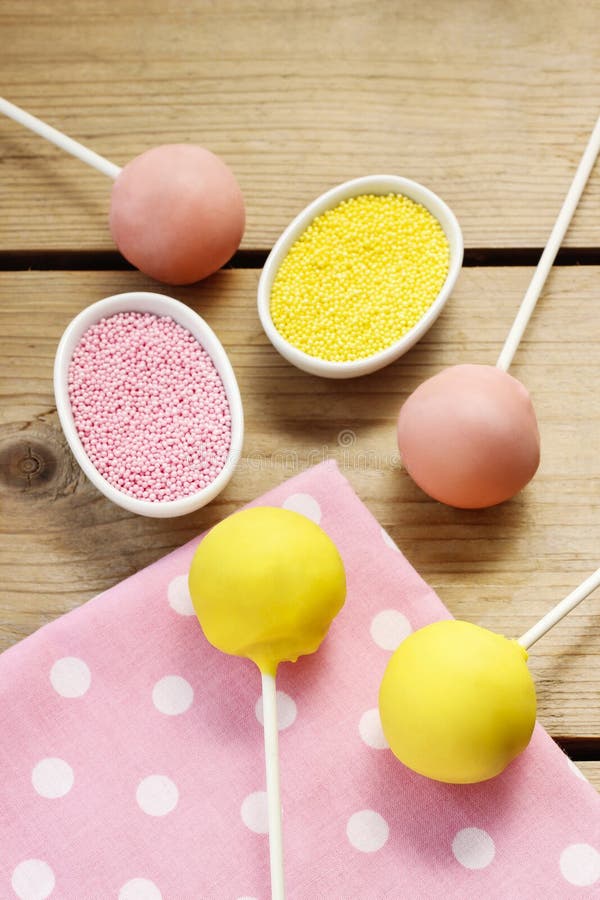 Yellow and pink cake pops stock image. Image of birthday - 44015673