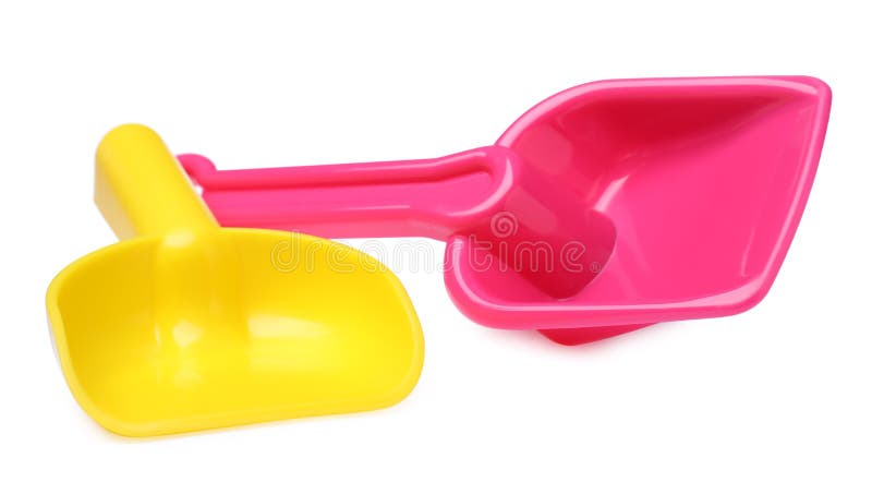 Yellow and Pink Plastic Toy Shovels on White Background Stock Photo ...