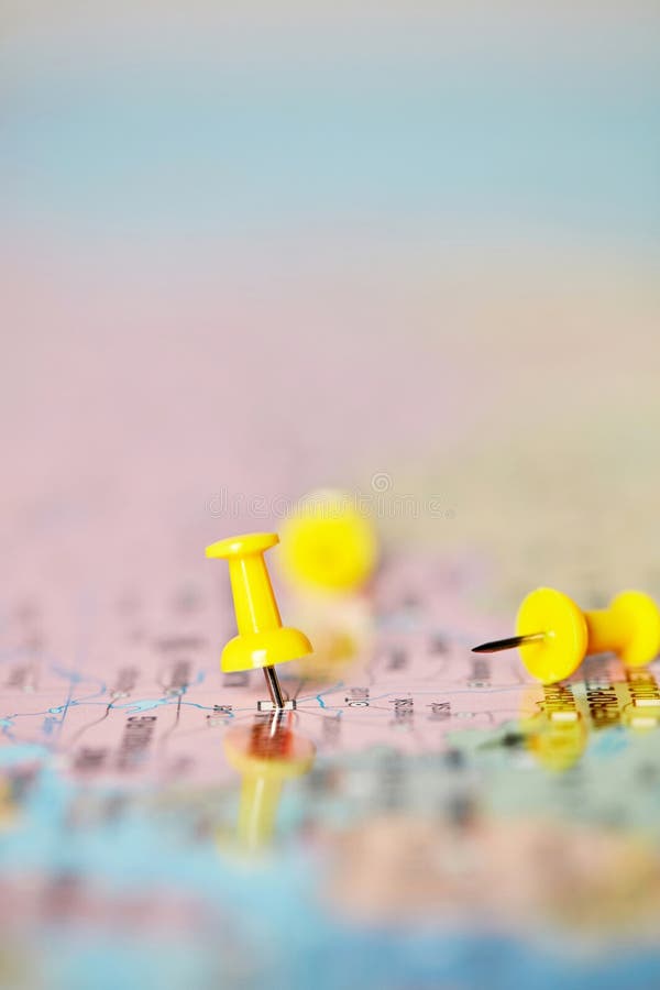 Yellow pins on city map stock photo. Image of pinning - 258878386