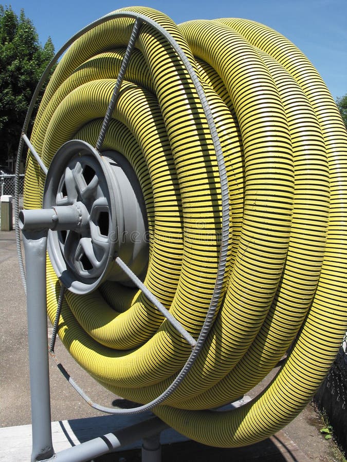 Yellow Pipe on a Reel stock image. Image of spool, reel - 1163911
