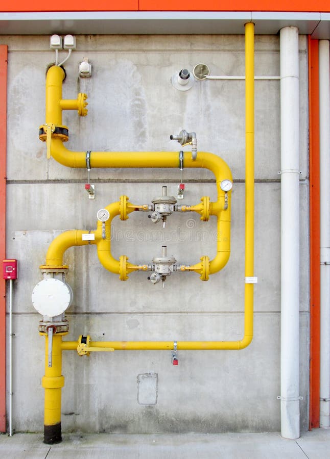 Yellow pipes stock photo. Image of distribution, gauge - 50454840