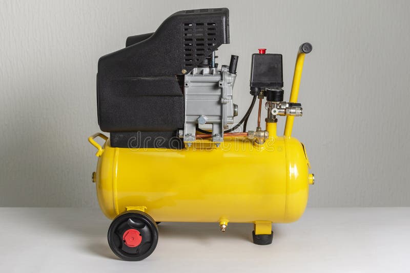 Yellow Piston Air Compressor. Compressing and Supplying Air Machine ...