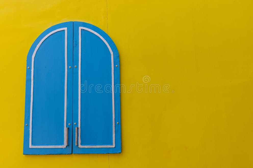 Yellow Plain Colour Wall with Colorful Object Stock Photo - Image of ...