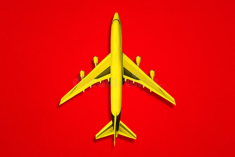 Yellow Plane on a Red Background. a Top View of a Flat Layout Stock ...