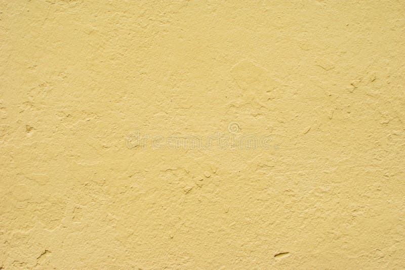 Yellow plaster background. stock photo. Image of concrete - 145874186