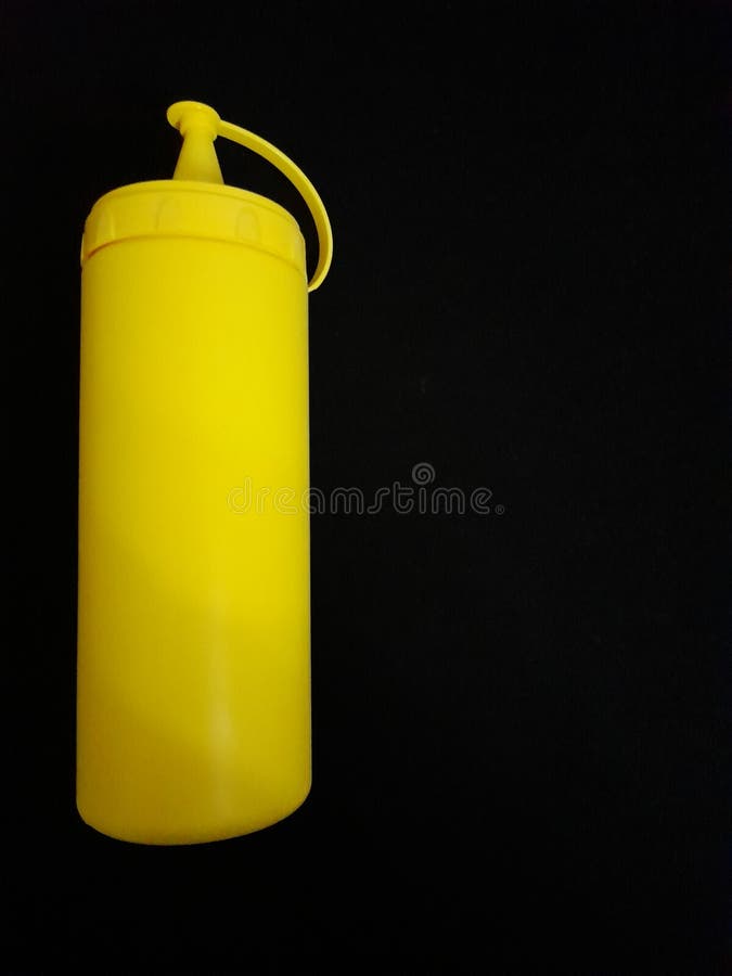Yellow plastic bottle stock photo. Image of oilbottle - 200542364