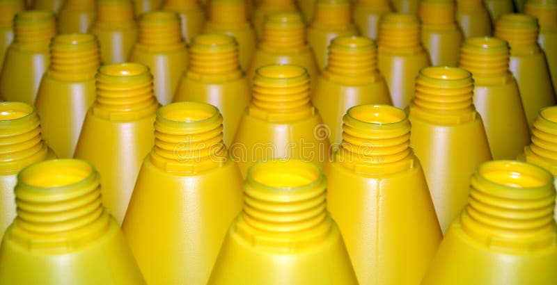 Yellow plastic bottles stock image. Image of care, package - 88400929