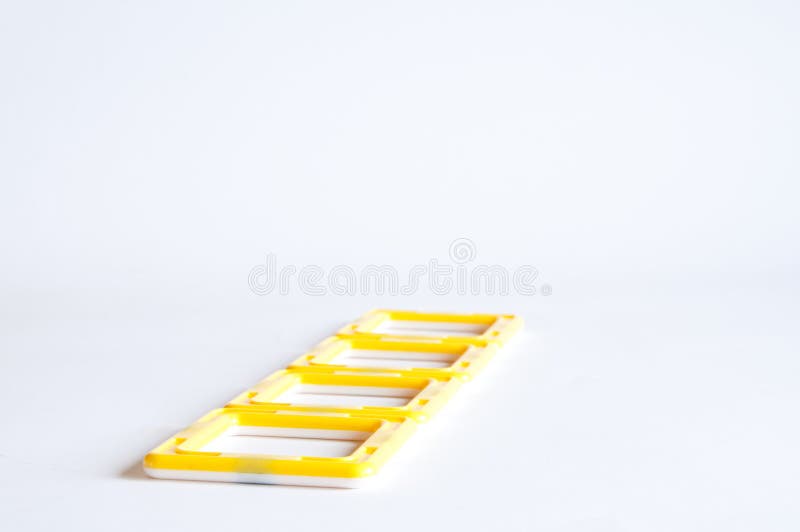 Yellow Plastic Children`s Designer with Magnets. on White Background ...