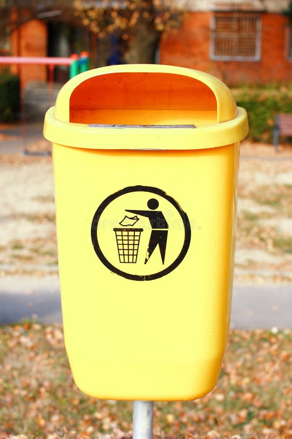 Yellow Trash Can stock photo. Image of environment, garbage - 131954924