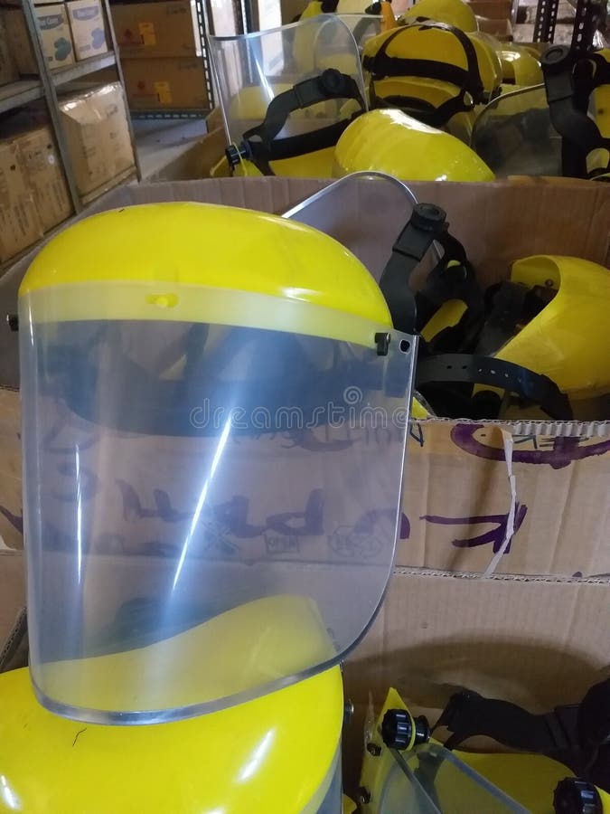 Yellow plastic faceshields stock photo. Image of shields - 193019074