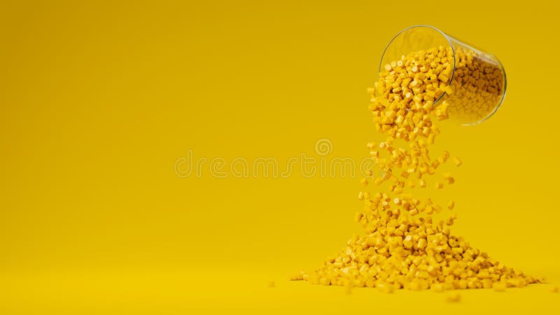 Yellow Plastic Polypropylene Granules Pouring from the Glass on a ...
