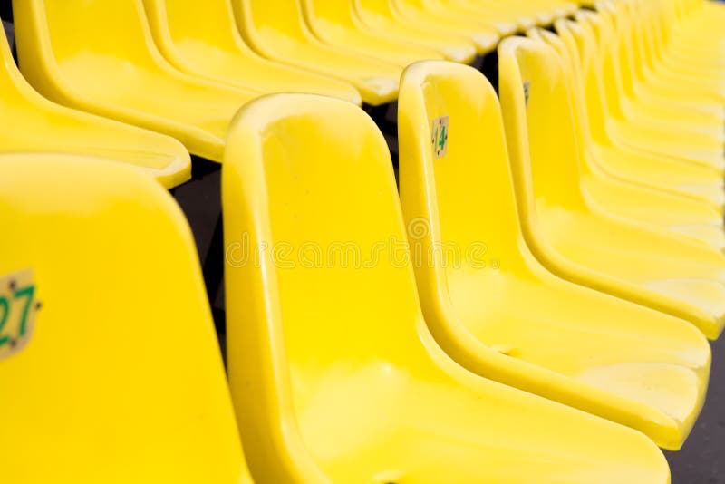 Blue Plastic Seats with the Lower Part of a Little Girl`s Body Sitting ...
