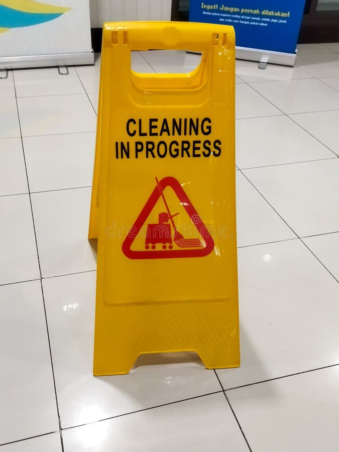 Yellow Plastic Sign Warn Cleaning in Progress Stock Image - Image of ...