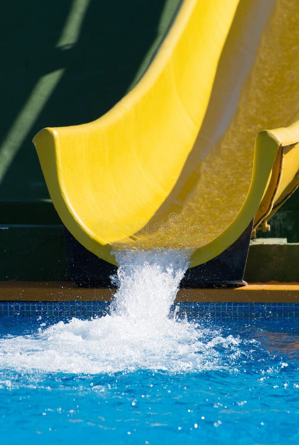 Yellow Water Slide stock photo. Image of summer, summertime - 5204460
