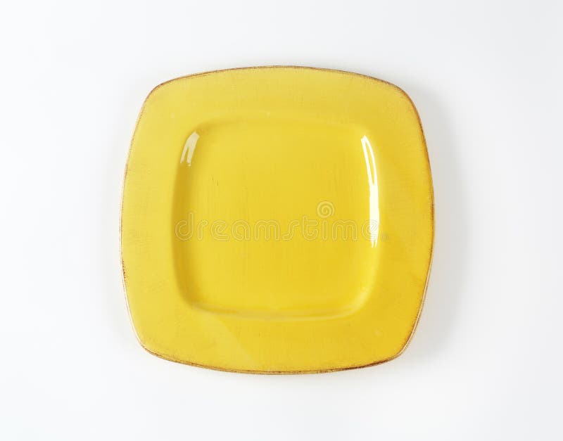 Yellow plate stock photo. Image of flat, empty, plate - 49504776