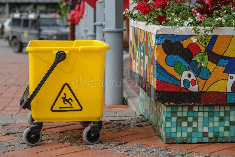 Yellow Plustic Bucket on Street Stock Photo - Image of outdoors ...