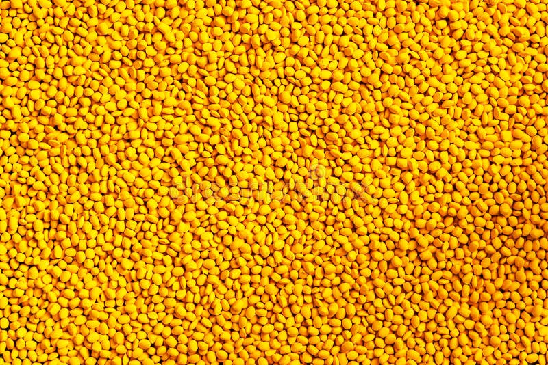 Yellow Polymer Dye in Granules, Background Texture Stock Photo - Image ...