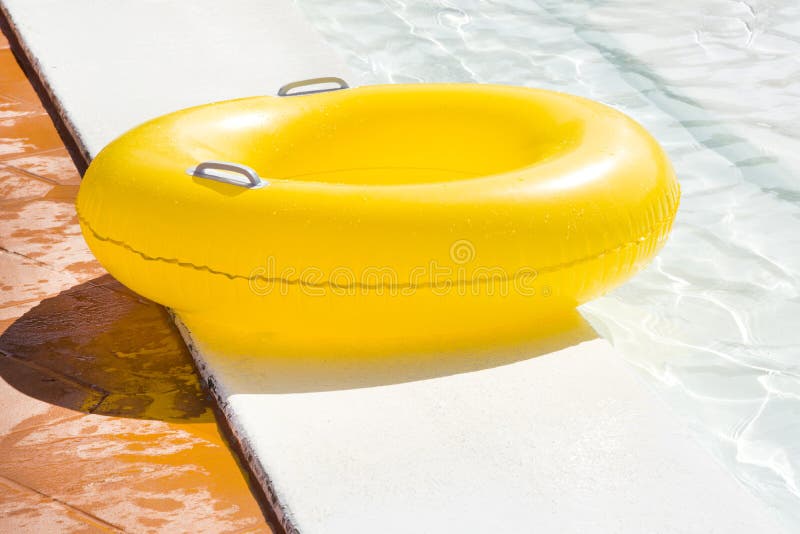 Yellow Pool Float in the Swimming Pool Stock Photo - Image of summer ...