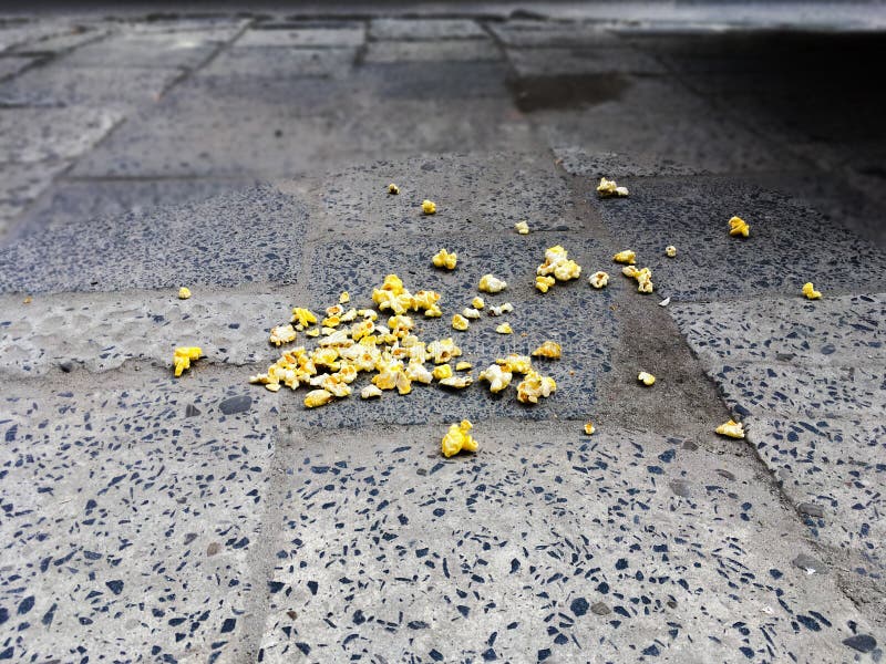 Yellow Popcorn is Scattered on the Road. Stock Photo - Image of asphalt ...