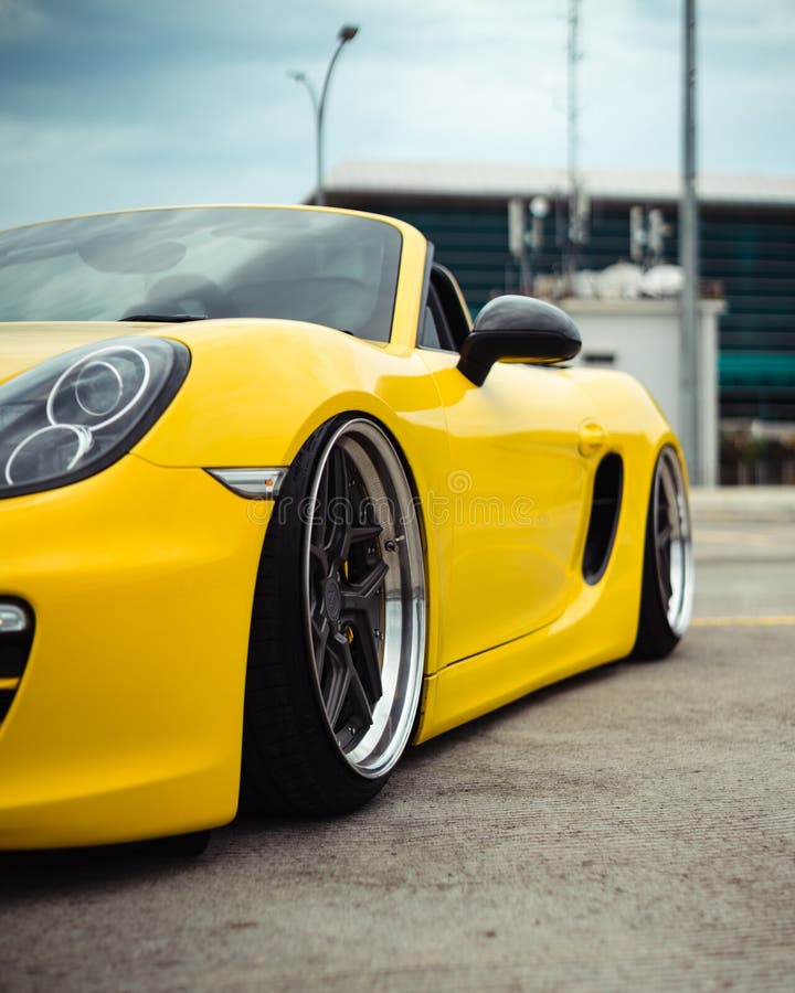 Yellow Porsche Boxster editorial photography. Image of yellow - 236578497