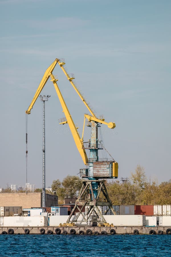 Yellow Port Crane and Containers for Freight on Ship Stock Image ...