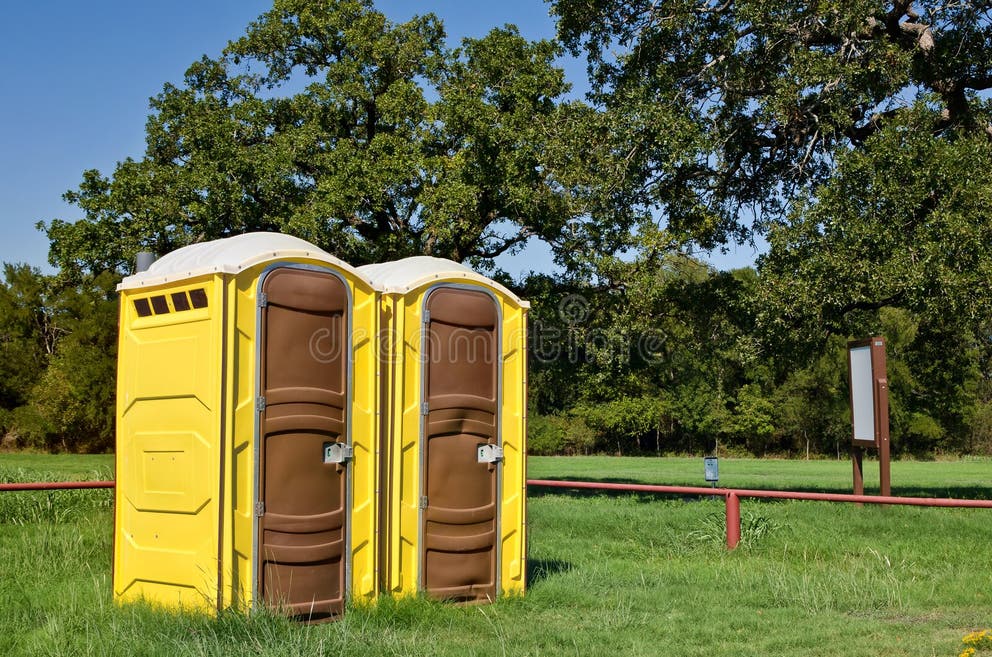 Yellow portable toilets stock image. Image of grass, outdoors - 26474895