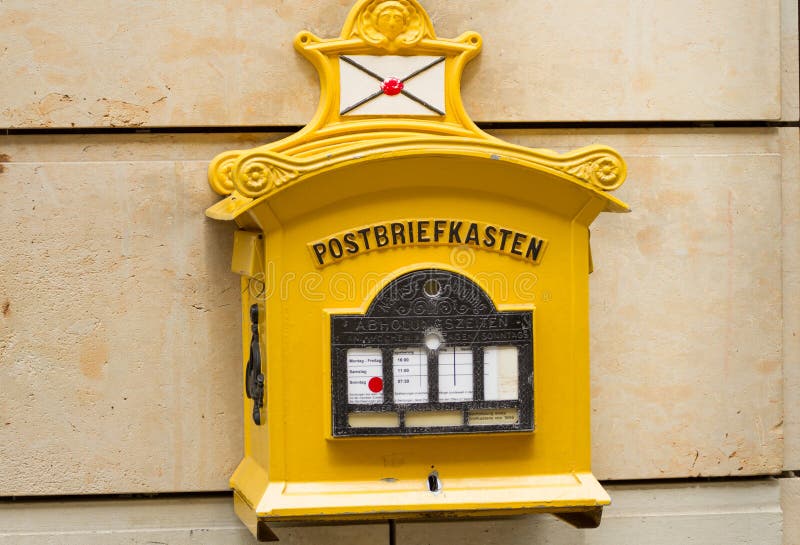 Yellow German mail box stock image. Image of postbriefkasten - 5466477