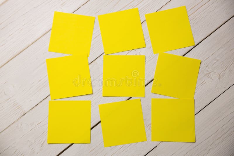 Yellow Post-it Sticky Notes on a Cork Board Stock Image - Image of ...