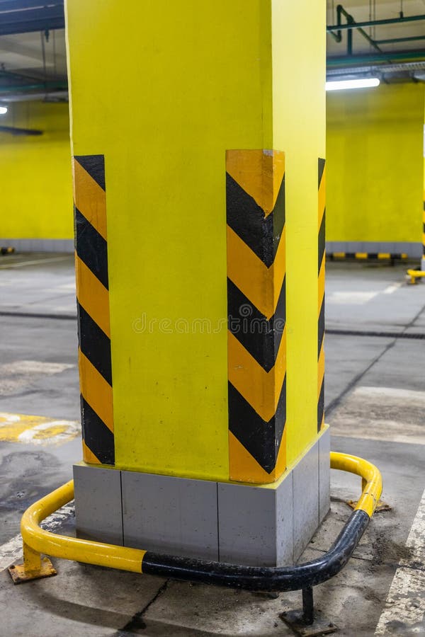 Yellow Post on Underground Parking Area Stock Photo - Image of post ...