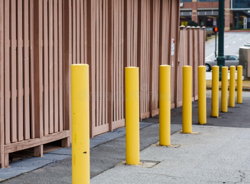Yellow Posts into Distance stock photo. Image of yellow - 31353960