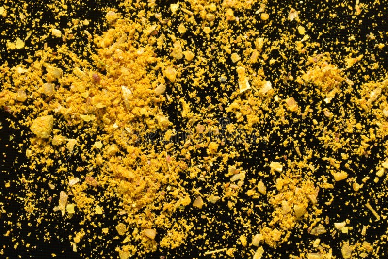 Yellow Powder is Scattered on a Black Background. Stock Photo - Image ...
