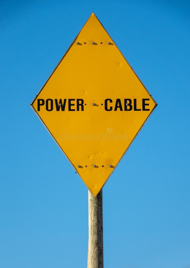 Yellow Power Cable Warning Sign Stock Photo - Image of electricity ...