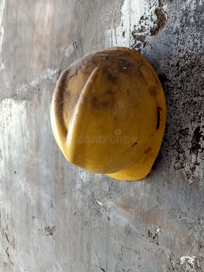 Yellow Project Helmet Attached To the Wall Stock Photo - Image of wall ...