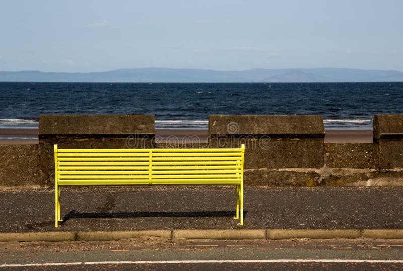 Yellow Public Bench at a Seafront Location Stock Photo - Image of ...
