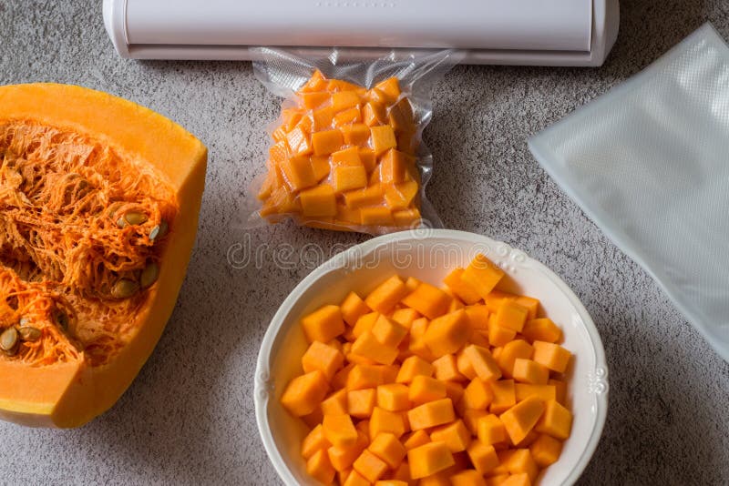 Yellow Pumpkin Cut into Slices and Cubes and Vacuum Packed Stock Photo ...