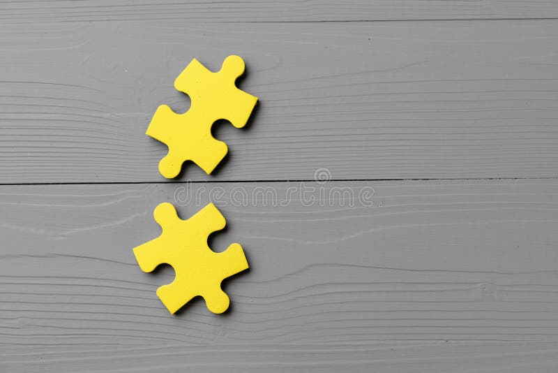 Yellow Puzzle Pieces on Gray Background Close Up Stock Photo - Image of ...