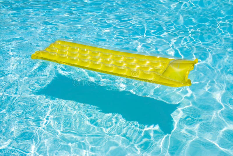 Yellow Raft Floating in a Pool Stock Photo - Image of yellow, concept ...