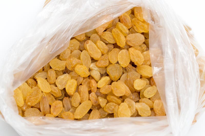Yellow Raisins in a Plastic Bag Stock Photo - Image of closeup, healthy ...