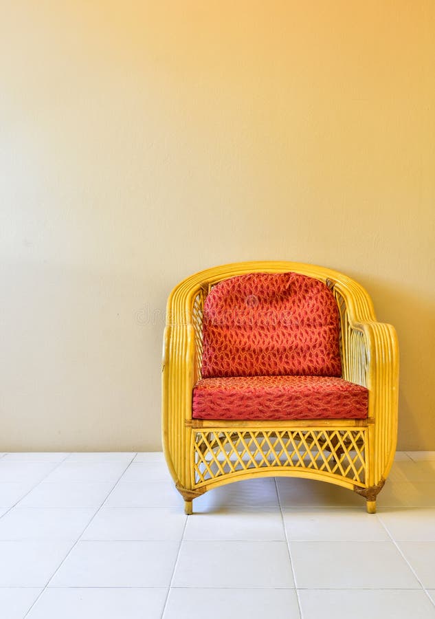 Yellow rattan armchair stock image. Image of furniture - 53502045