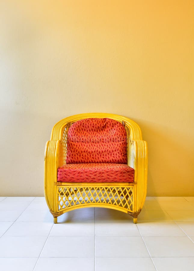Yellow rattan armchair stock image. Image of wicker, comfortable - 53502129