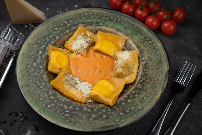 Yellow Ravioli with Cheese in a Plate Stock Photo - Image of homemade ...
