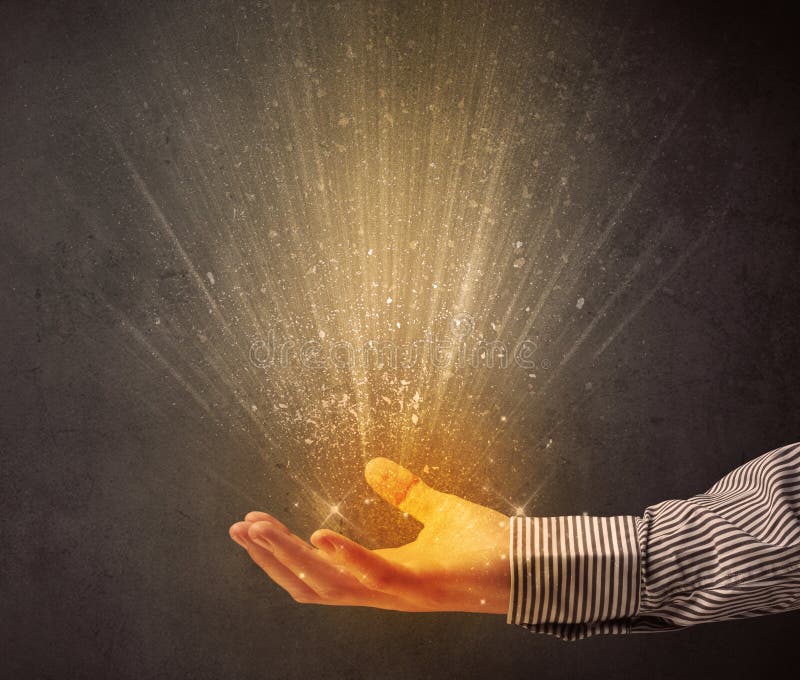 Hand holding yellow light stock image. Image of gesture - 105863709