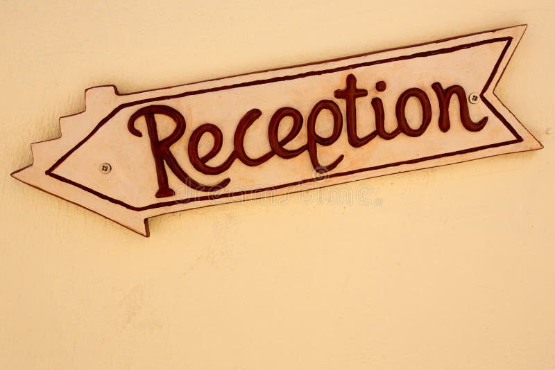 A Yellow Reception Sign Board in a Hotel Stock Photo - Image of ...