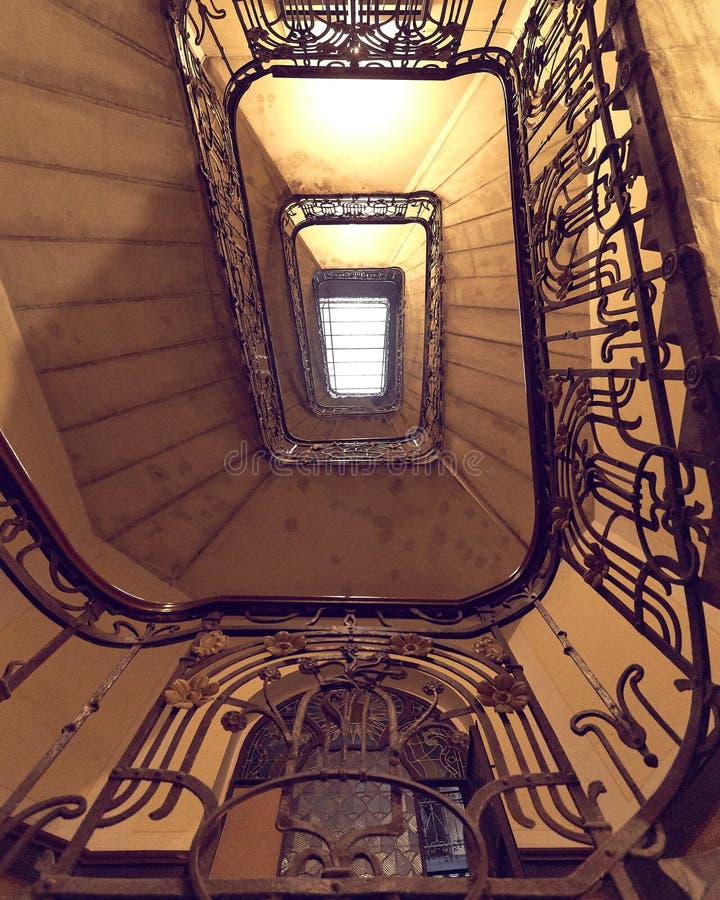 Yellow Rectangular Spiral Staircase with Black Railings Top View Stock ...