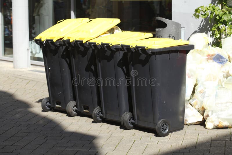 Yellow Recycling Bins stock photo. Image of garbage, recycling - 97026618