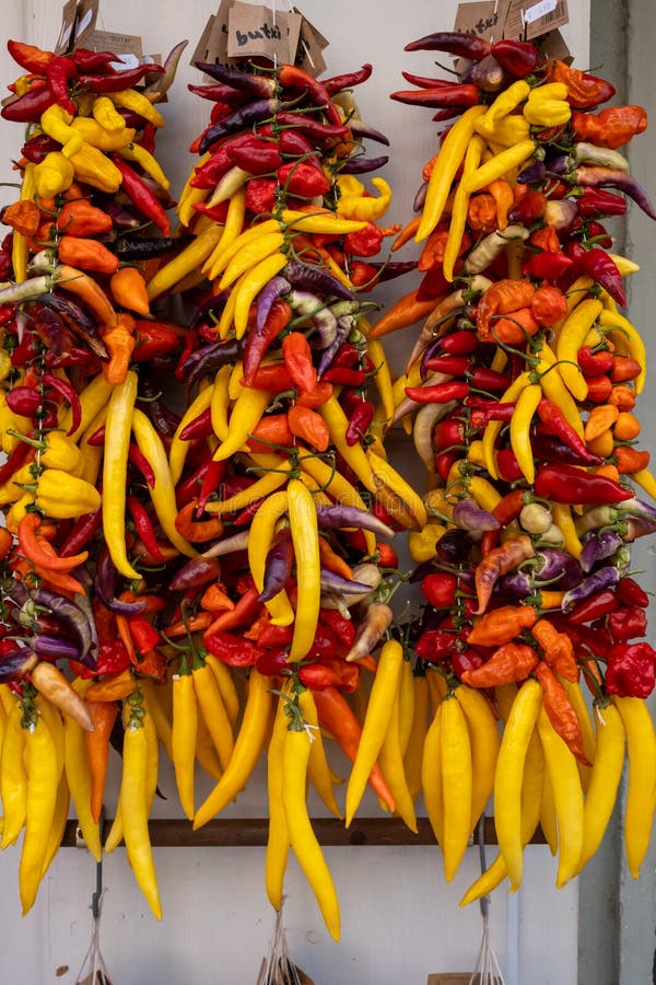 Yellow and Red Chilli Peppers To Dry on the Wall for a Long Time Stock ...
